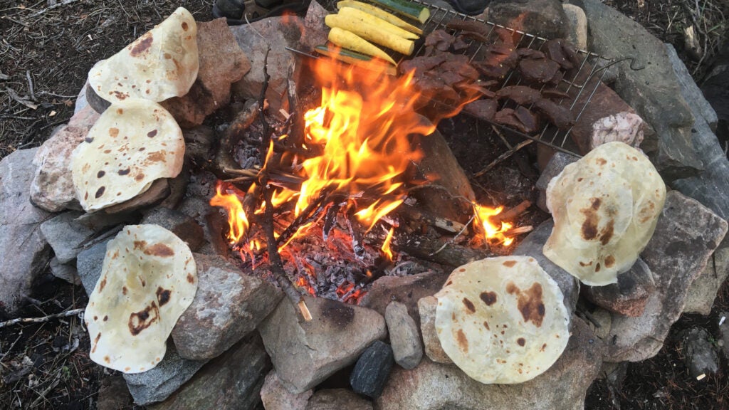 How to Cook Over a Fire, According to a Survival Instructor - Backpacker